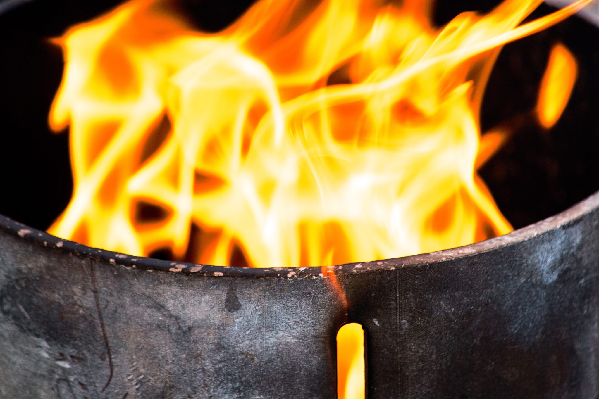 Bright flame of fire from a metal pipe is close - Compliance Standard Group